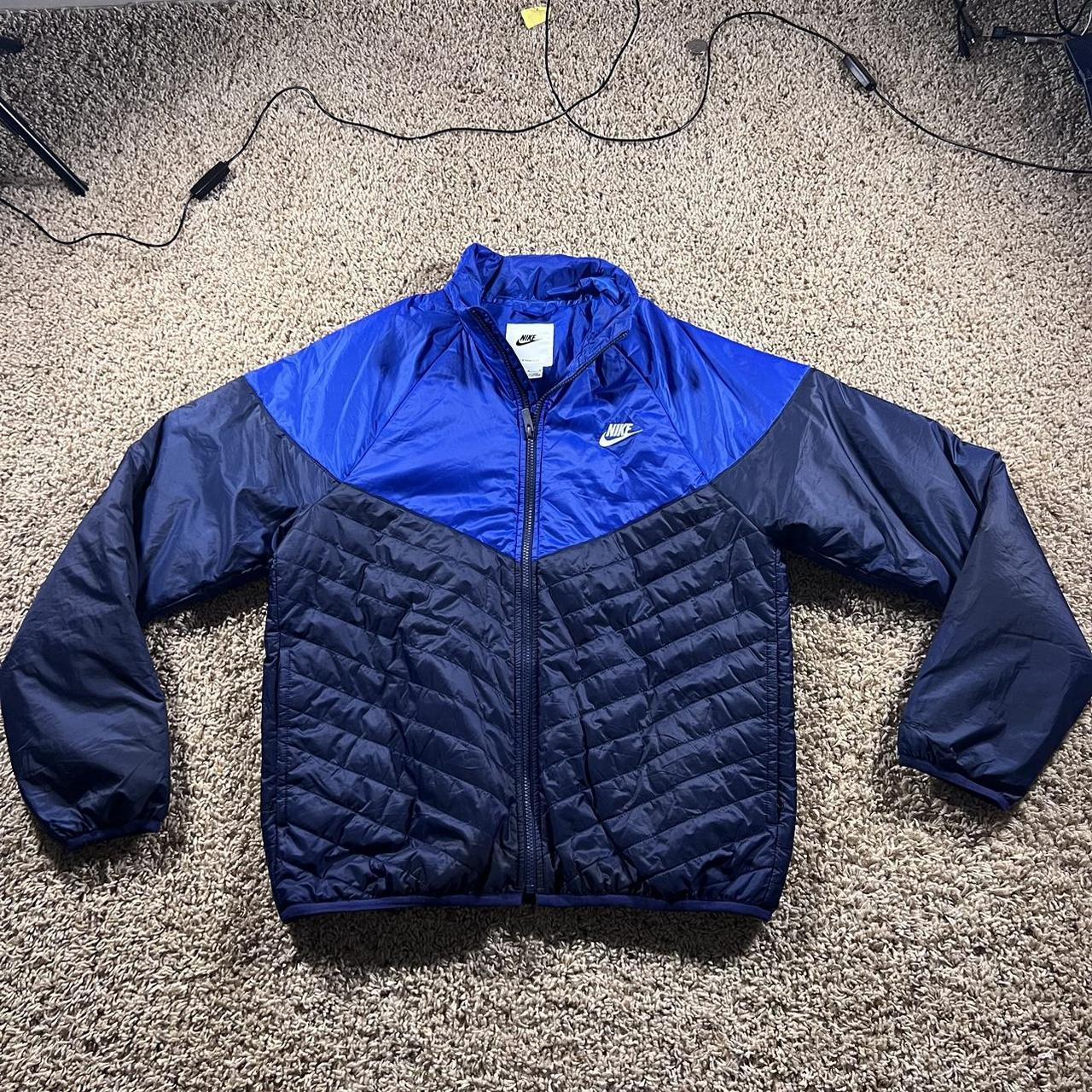 Blue and navy Nike puffer jacket men’s size... - Depop