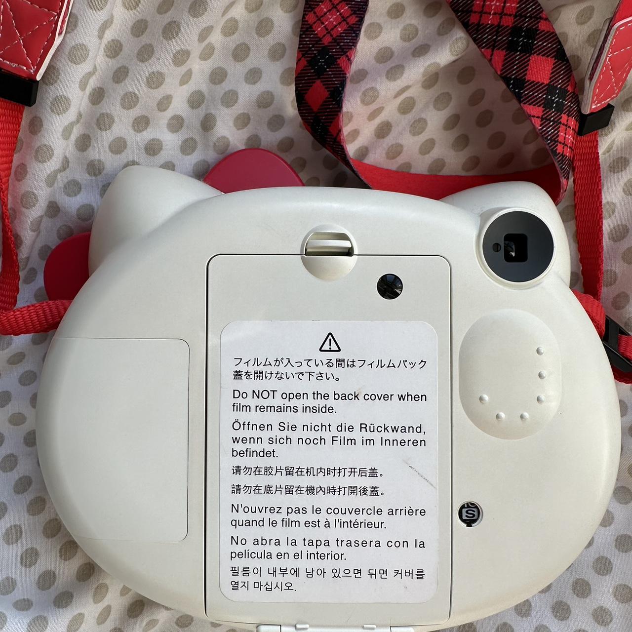 Hello Kitty Instax mini camera in cream and red... - Depop