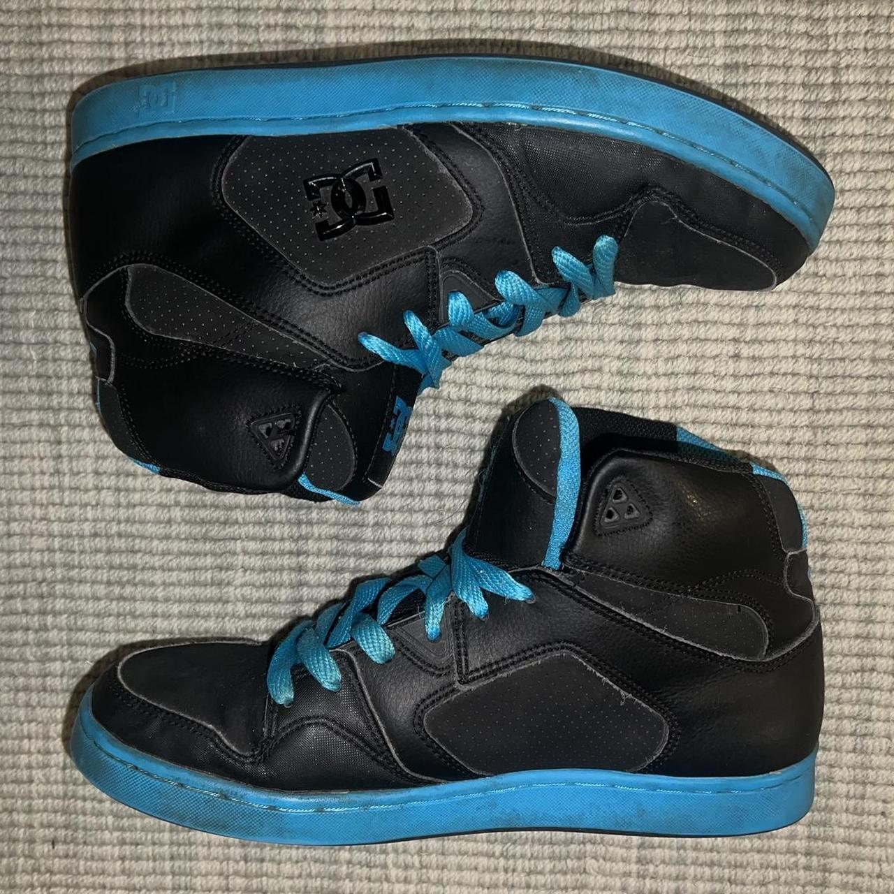 blue and black high top dc skate shoes size 10.5... | Depop