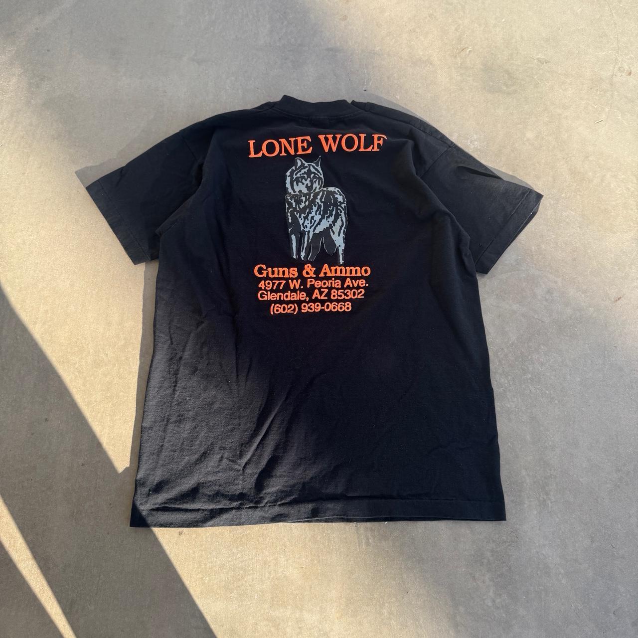 Vintage Lone Wolf Guns & Ammo black and orange tee.... | Depop