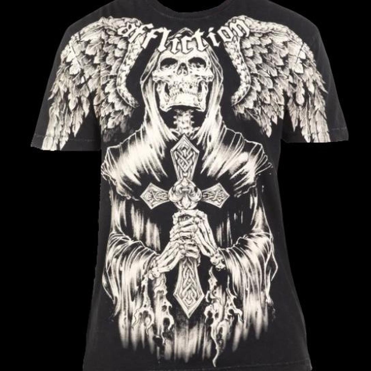 Affliction Skeleton Holding Cross With Wings... - Depop