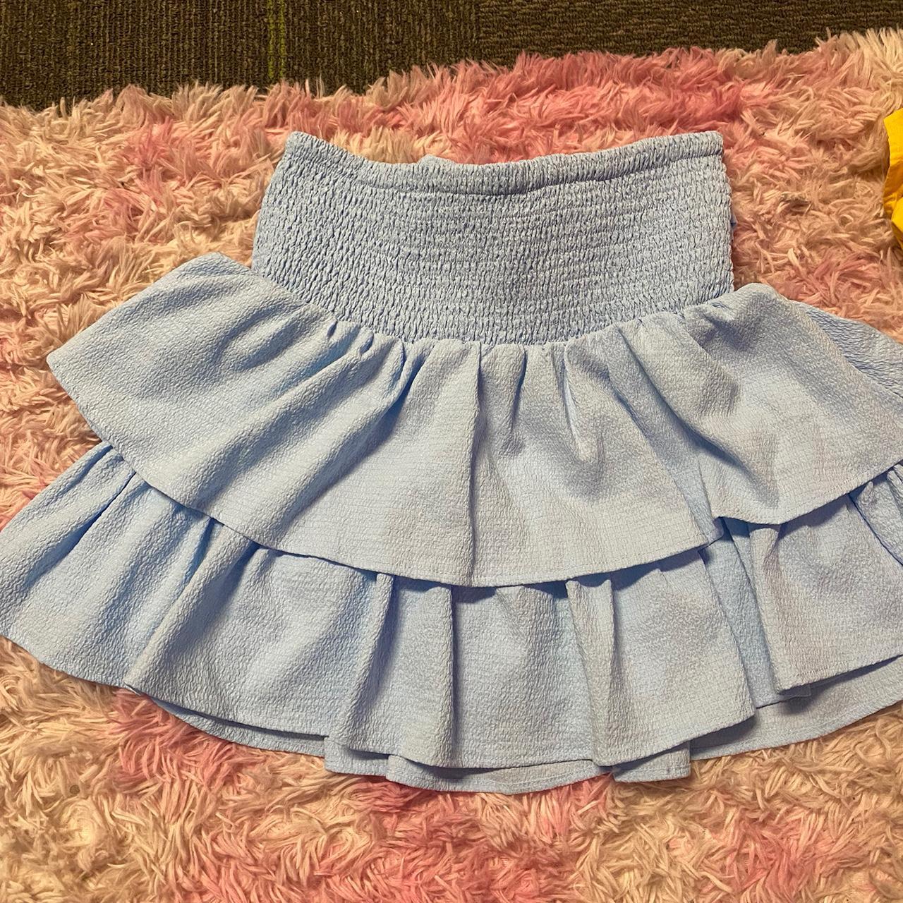 Baby blue ruffle mini skirt with bow detail in the... - Depop