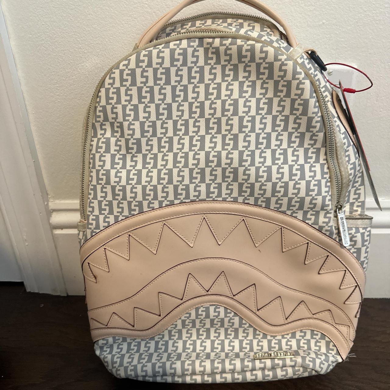 large spray ground backpack has 2 little mark on it - Depop
