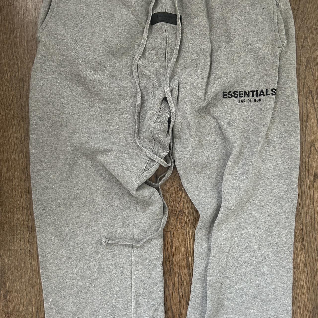 Fear of God Essentials grey joggers. Size small.... - Depop