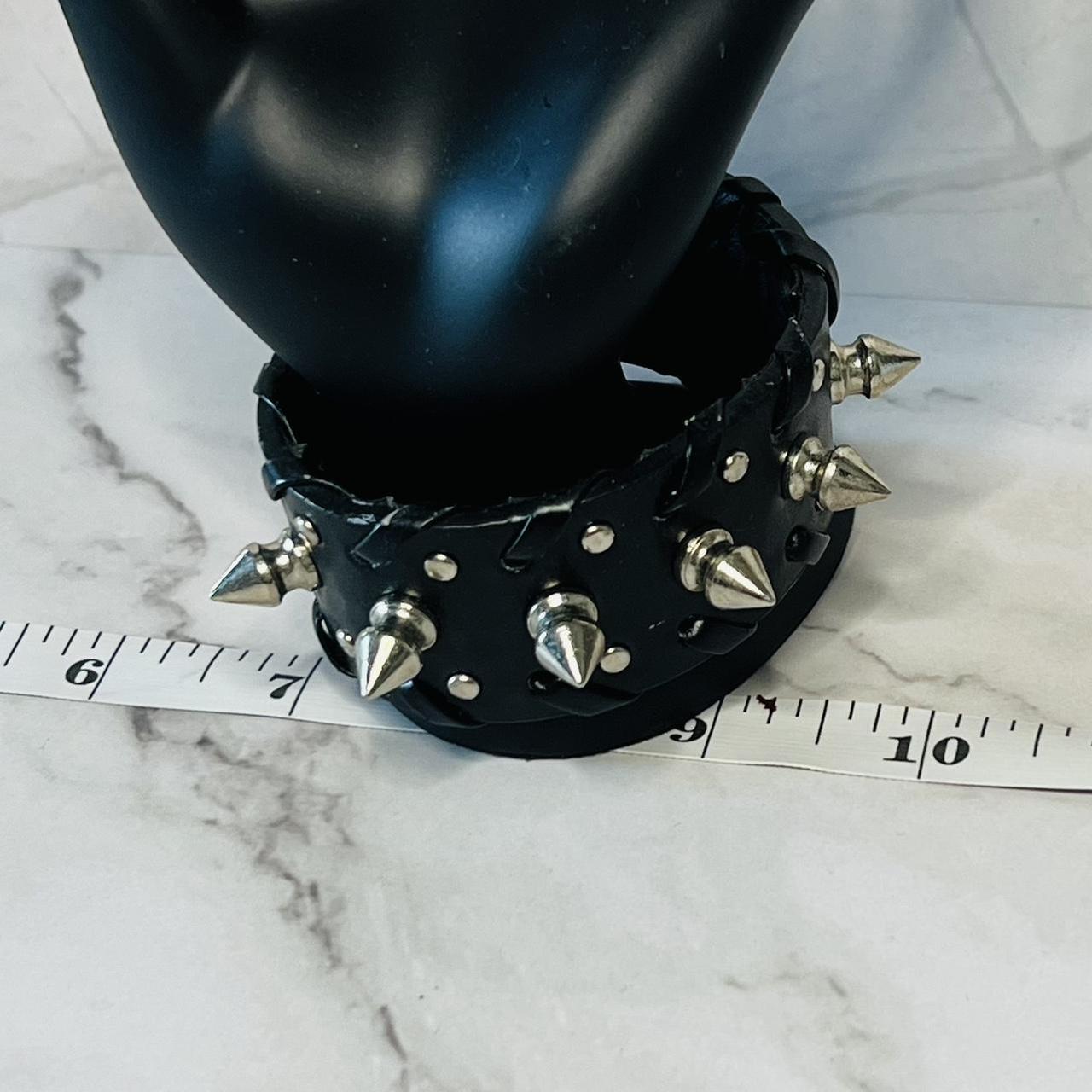 Black and silver spiked studded leather cuff... - Depop