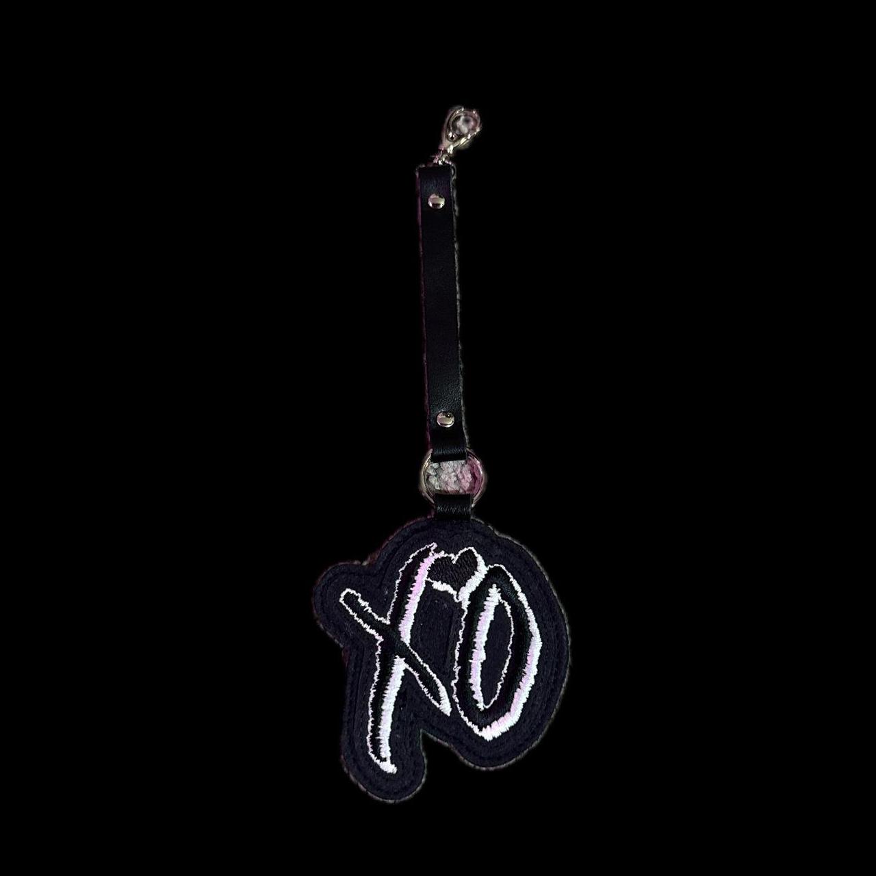 The Weeknd XO patch logo leather keychain Bought at... - Depop