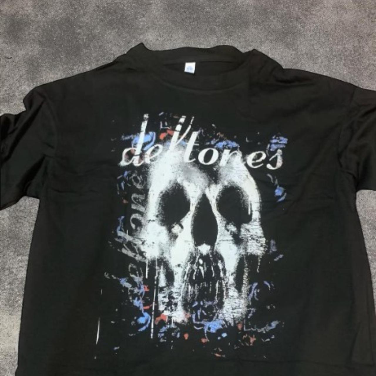 Black Deftones band tee featuring a bold skull... | Depop