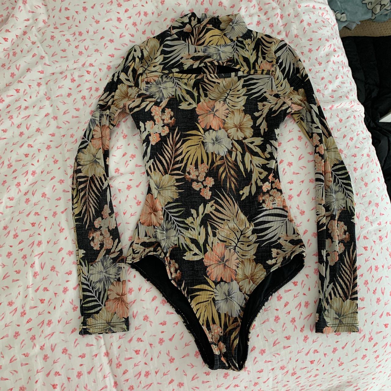 Rip curl one piece floral swimsuit with zipper back.... - Depop