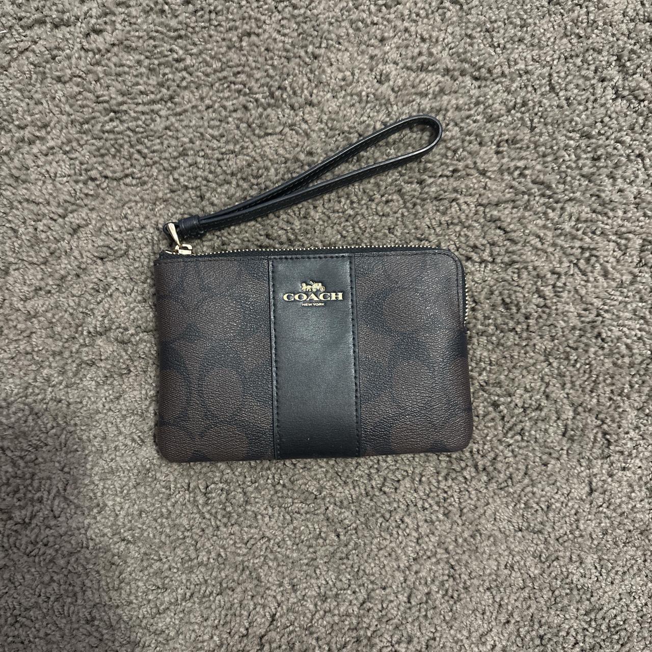 This wrist-lit bag features a sleek black base with... | Depop