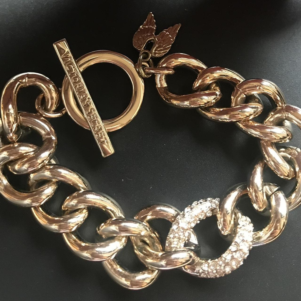 Victoria secret gold color bracelet angel wings and... | Depop