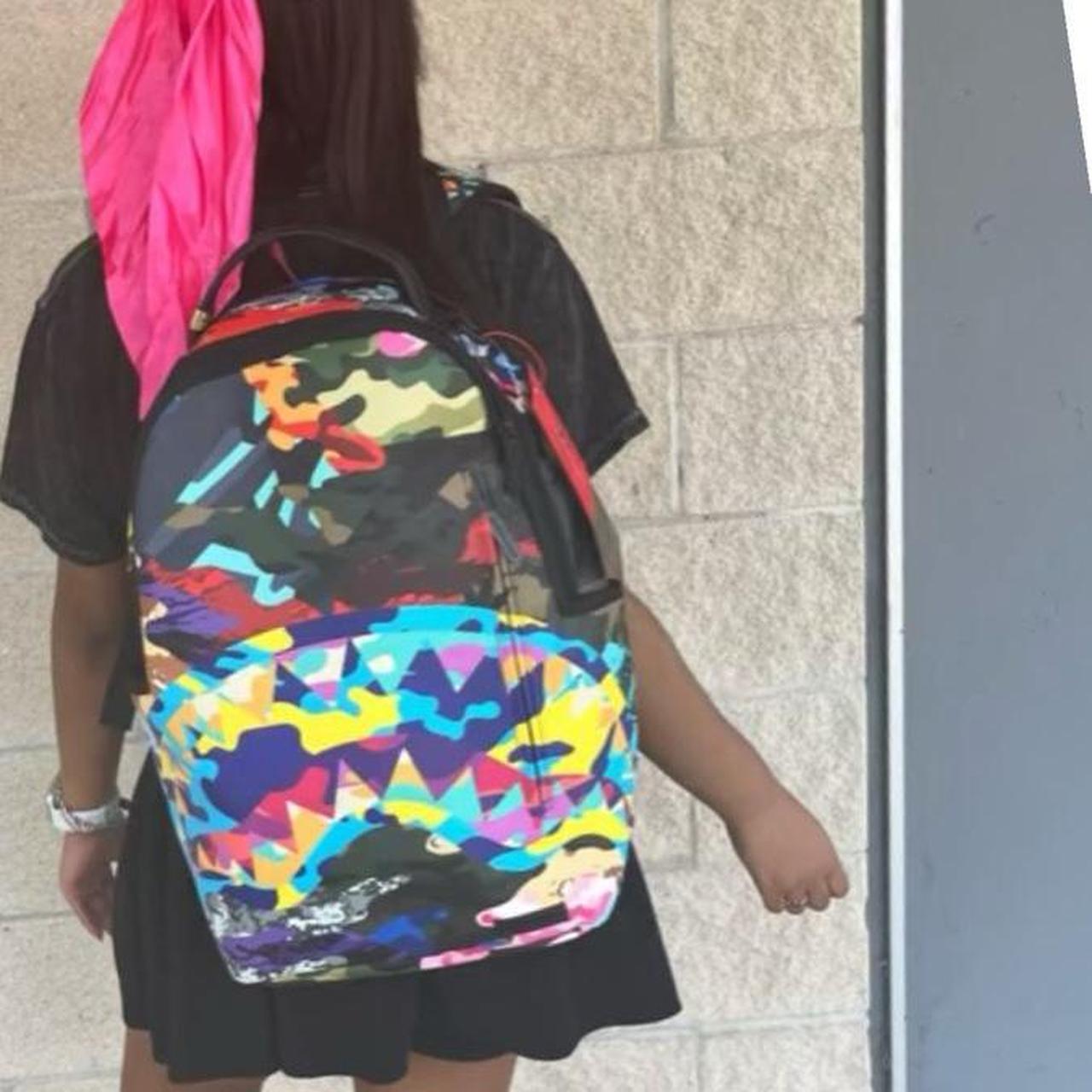 Colorful sprayground backpack, spacious, zippers not... | Depop