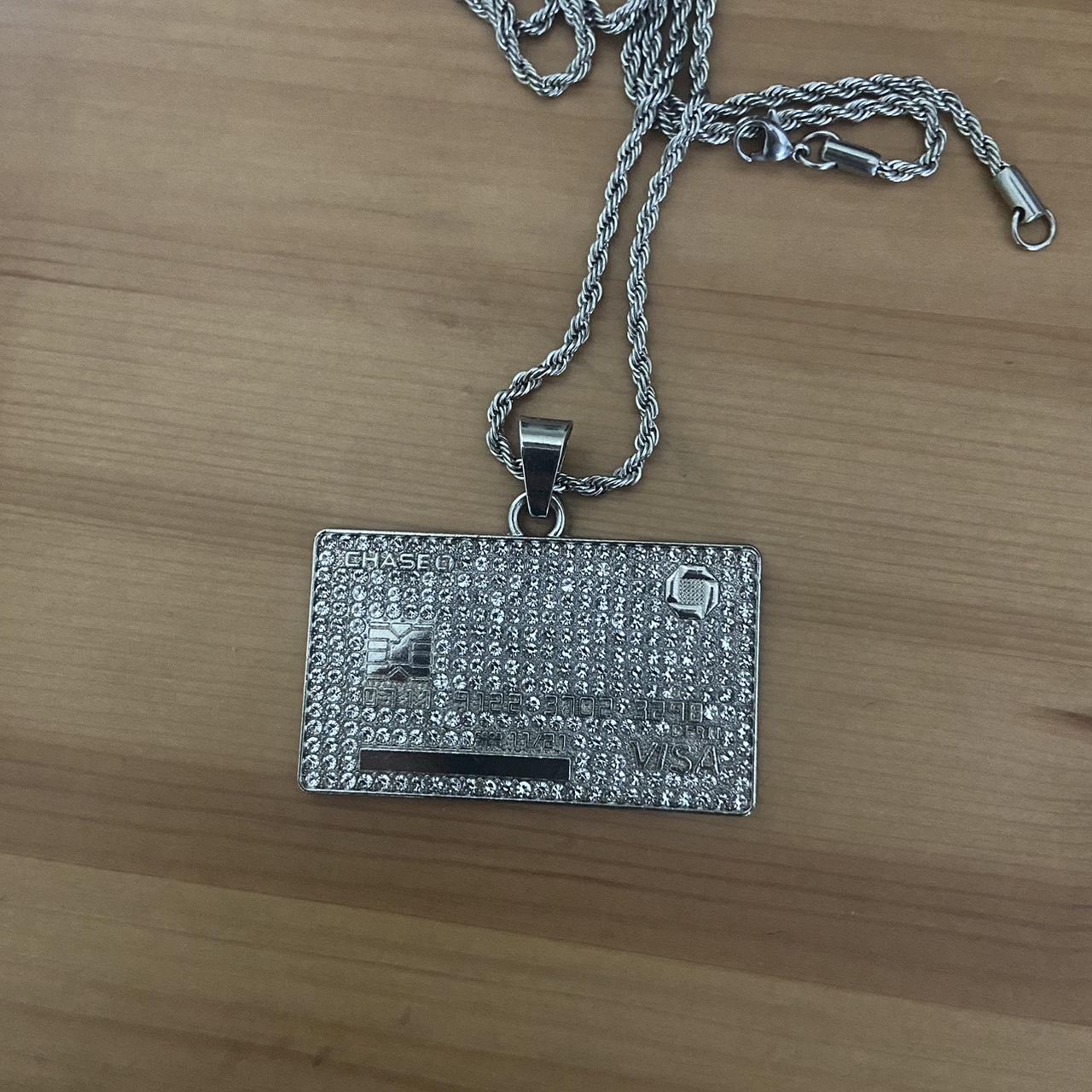 Punchmade Dev credit card chain - Depop