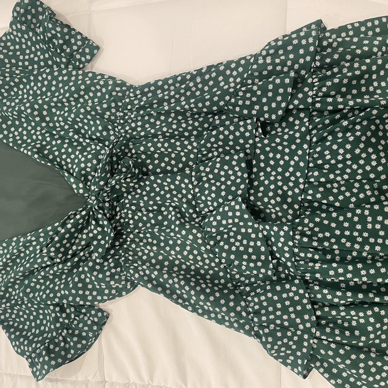 Green ruffle short dress with white flower... - Depop