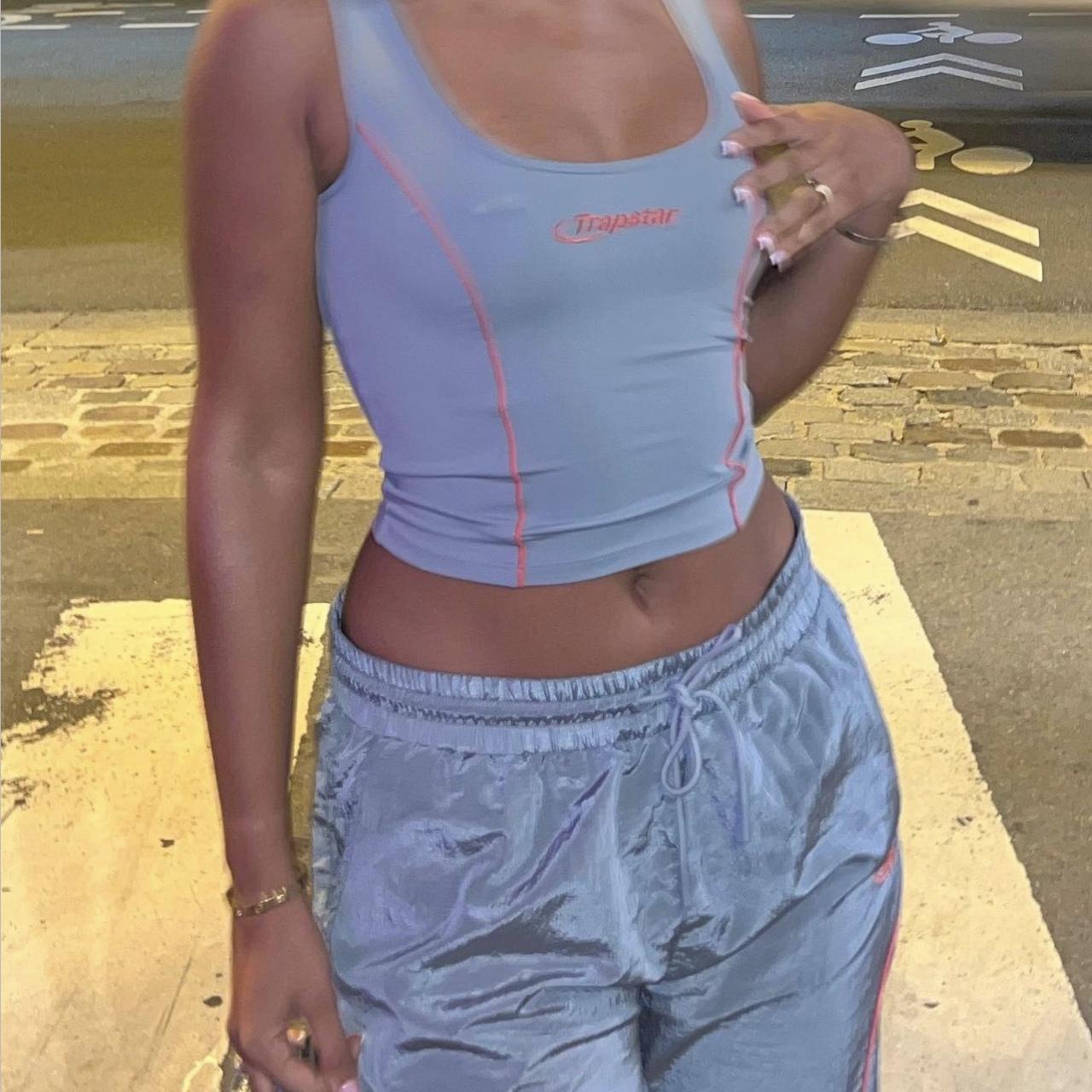 Brand new womens Trapstar set. Medium top and size... - Depop