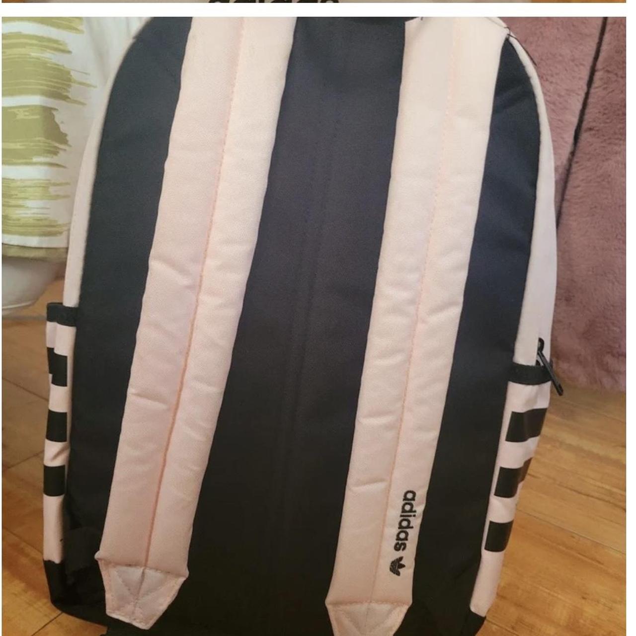 Adidas pink and black backpack with room on the... - Depop
