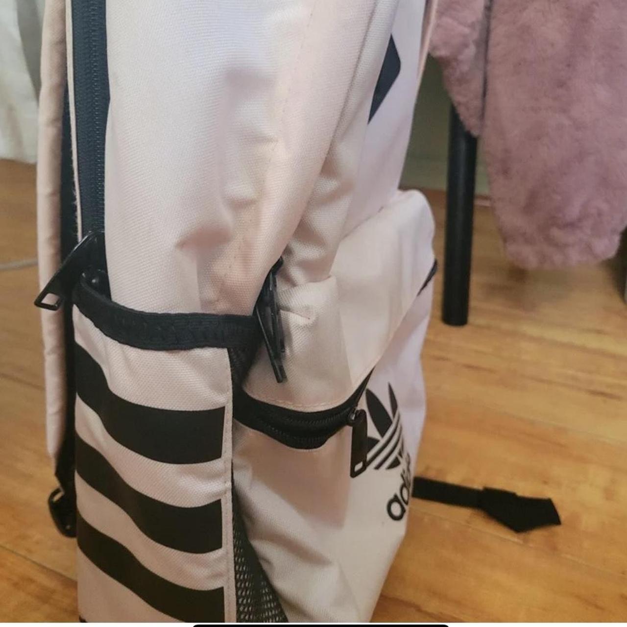 Adidas pink and black backpack with room on the... - Depop