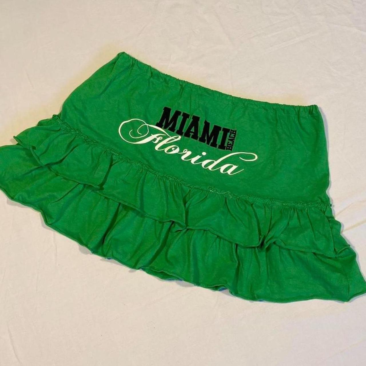 Surf Style green mini skirt with ruffles and graphic... - Depop