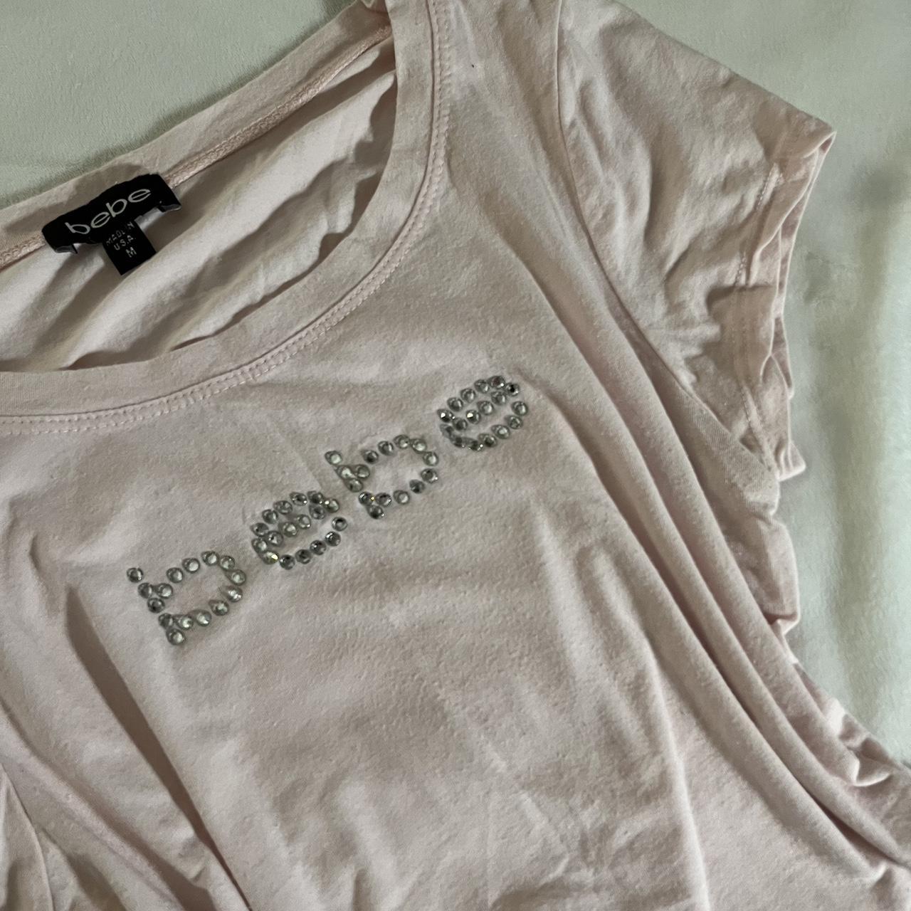 Pink Bebe rhinestone baby tee. Size m. The only flaw... - Depop