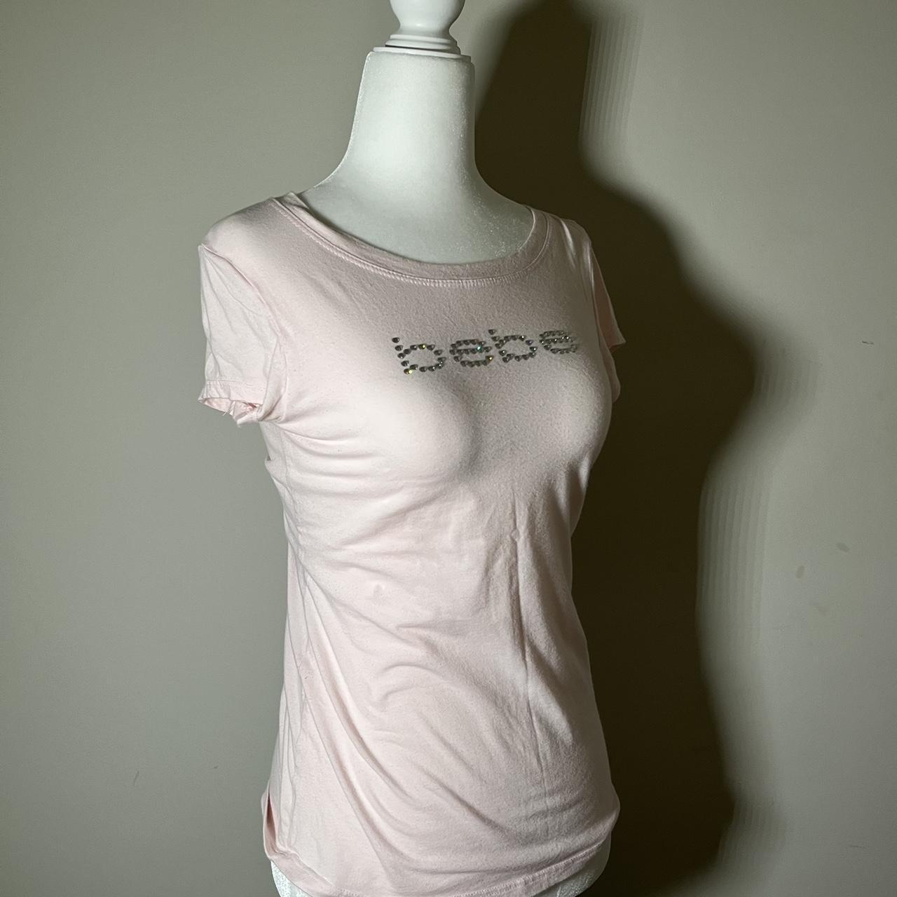 Pink Bebe rhinestone baby tee. Size m. The only flaw... - Depop