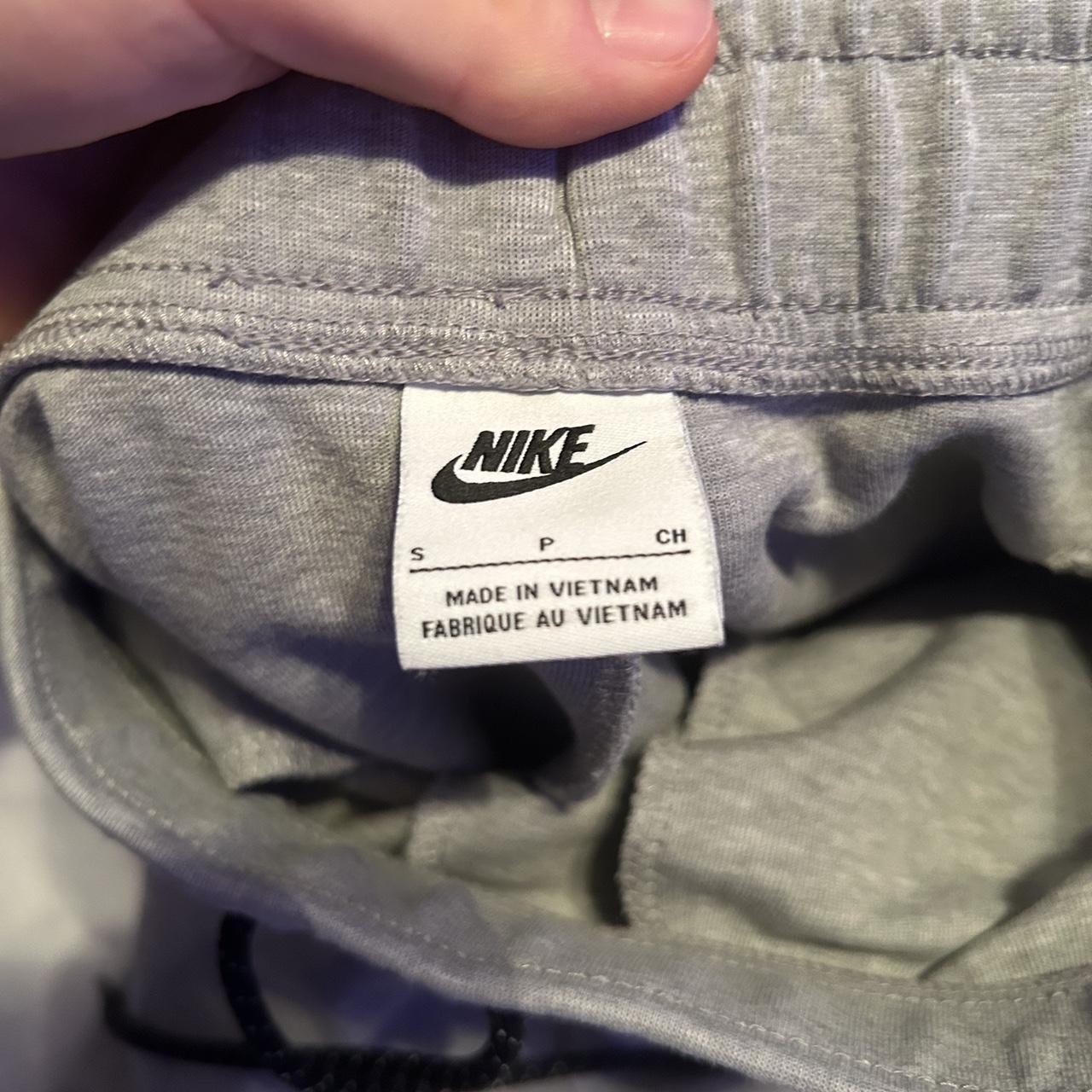 Grey Nike tech pants - Depop