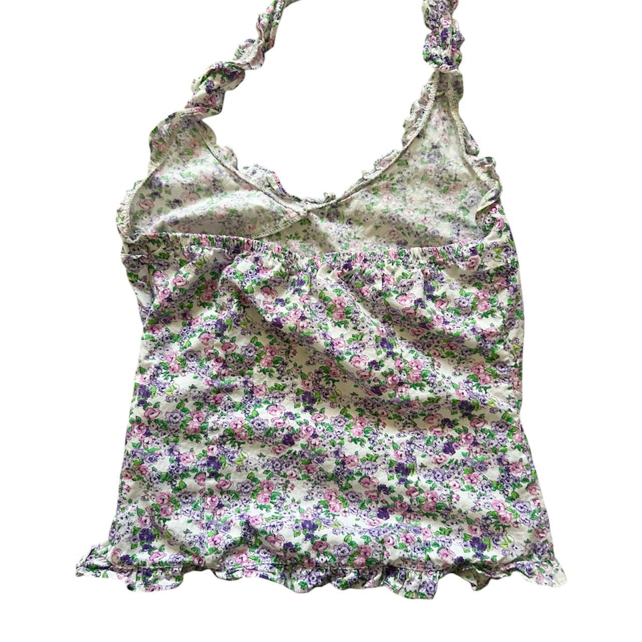 Floral ruffled halter top Features adorable floral... | Depop