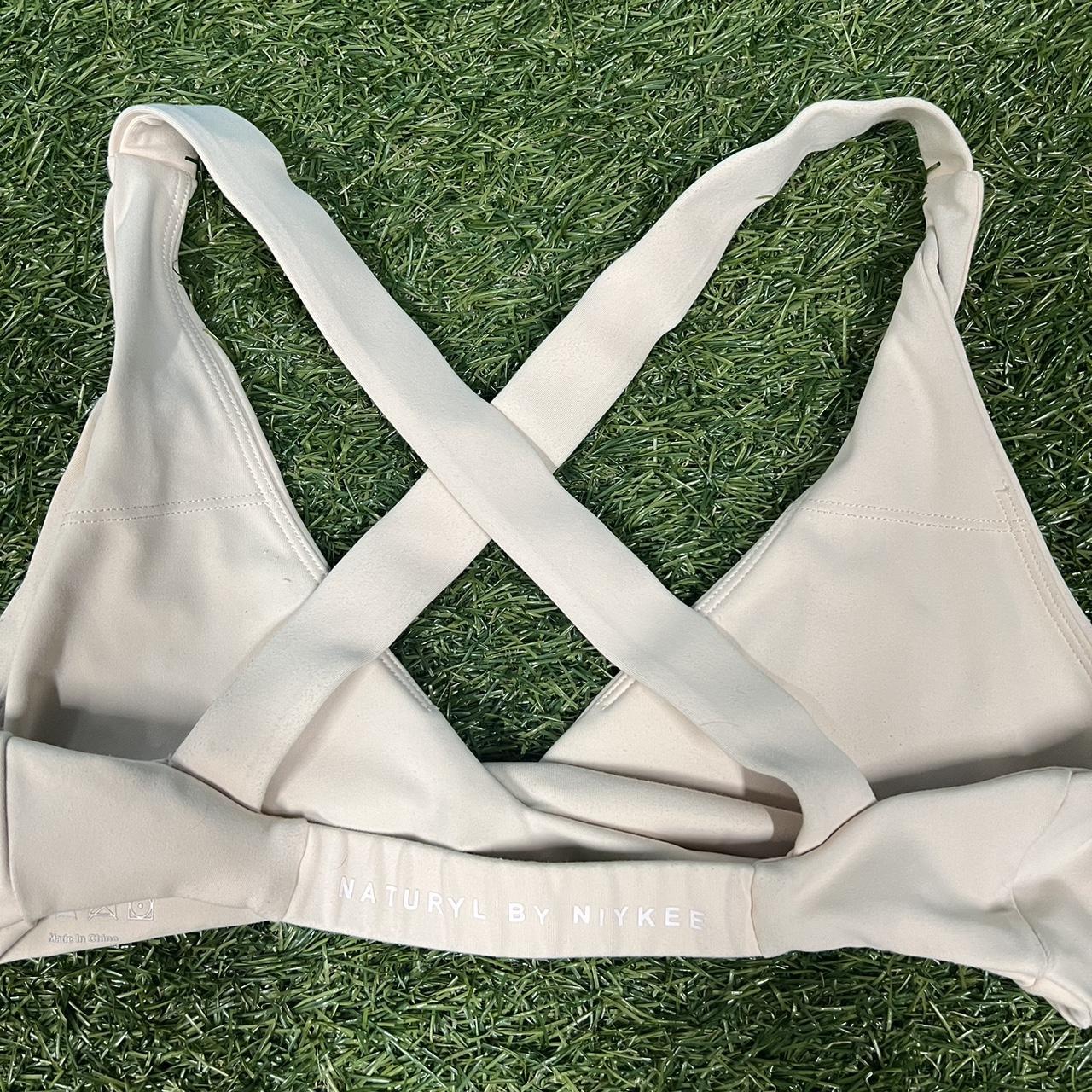 NATURYL Bundle Yoga twist sports bra and grey twist... | Depop
