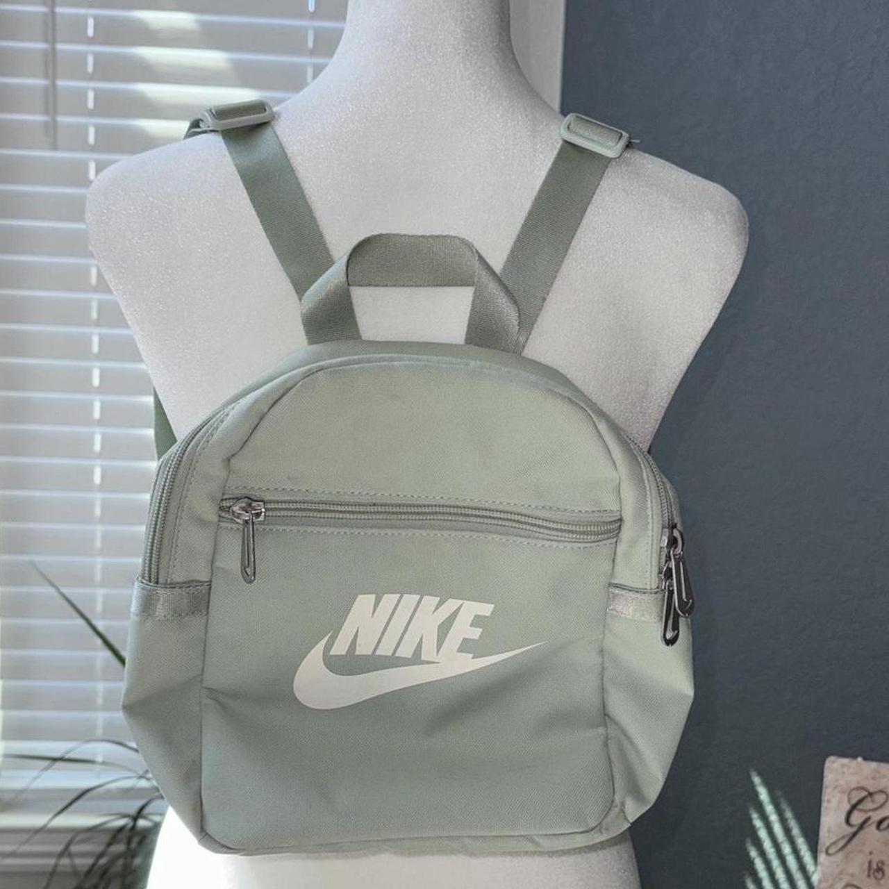 Nike mint green mini backpack. Wasn't used much but... | Depop