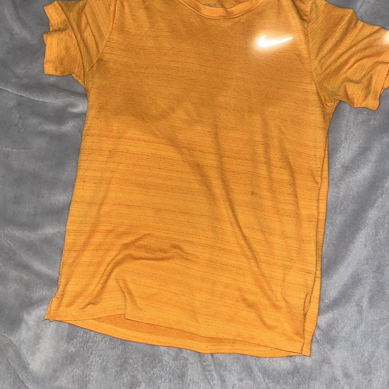 L kids orange nike dri fit - Depop