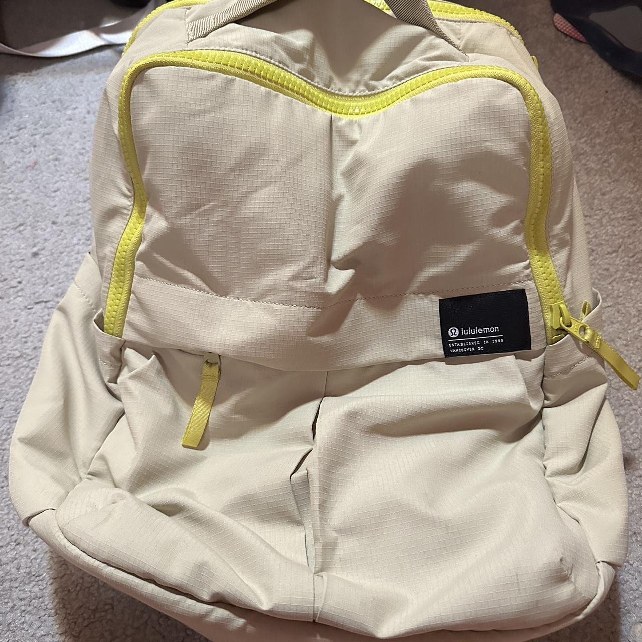 Lululemon cream and yellow backpack #lululemon... - Depop