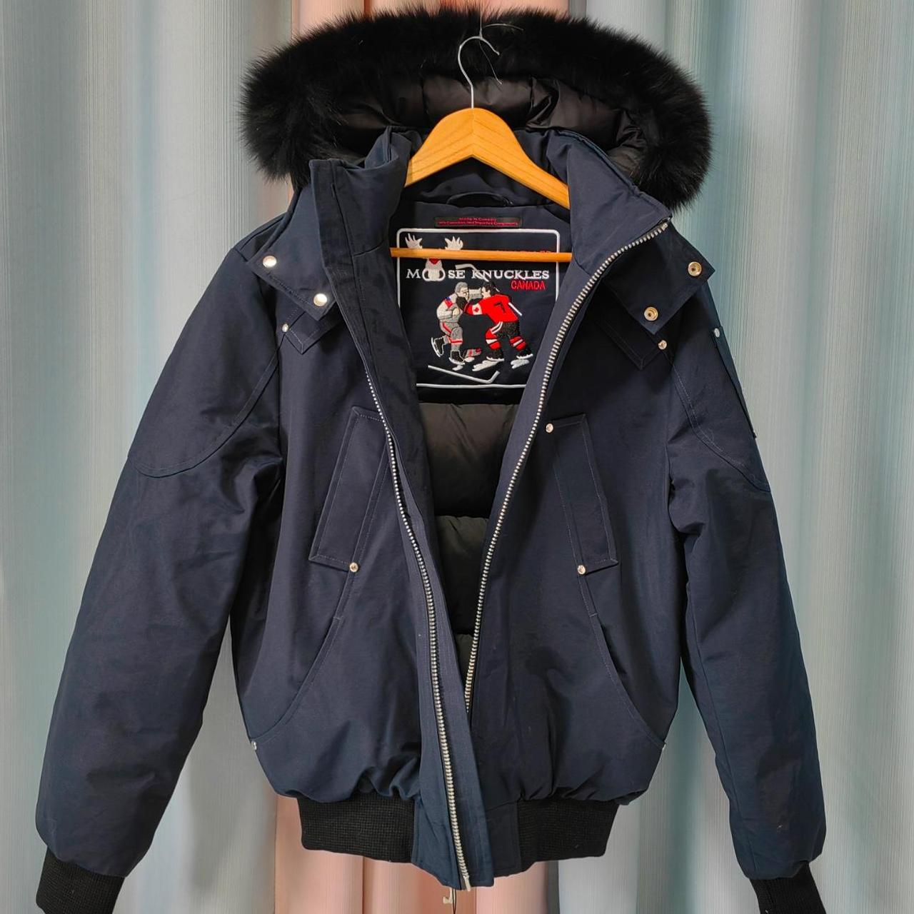 Navy Moose Knuckle Jacket with black fur hood - Depop