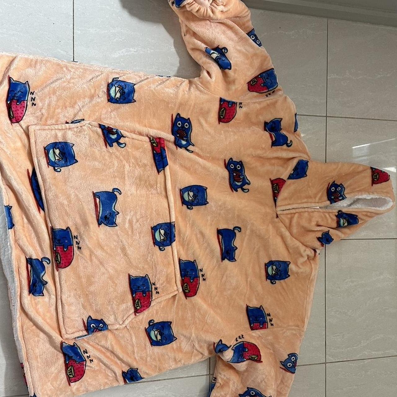 Orange Oodie with Blue Cats perfect for winter... - Depop