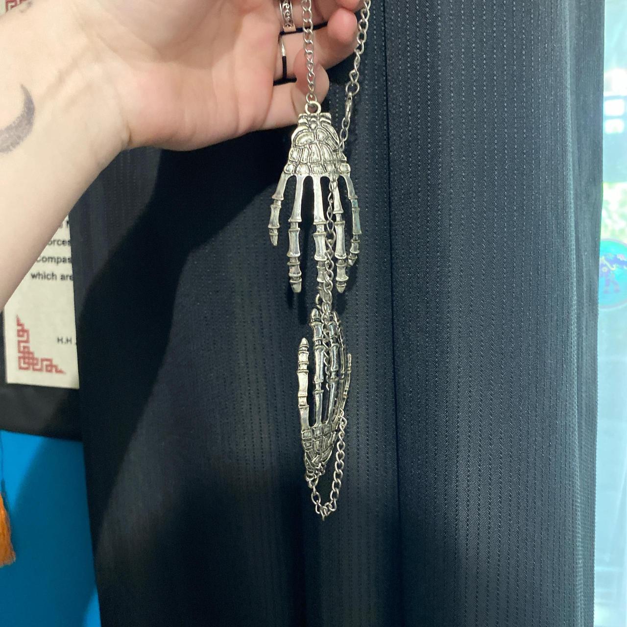 Silver skeleton hand necklace with adjustable chain... - Depop