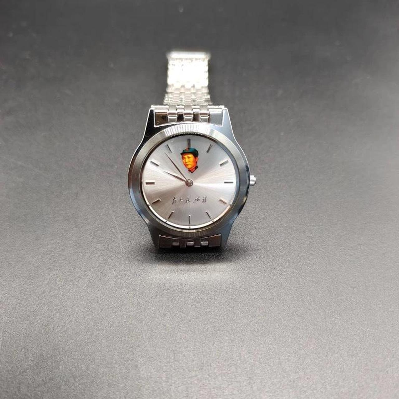 Silver watch with a classic design and a unique... - Depop