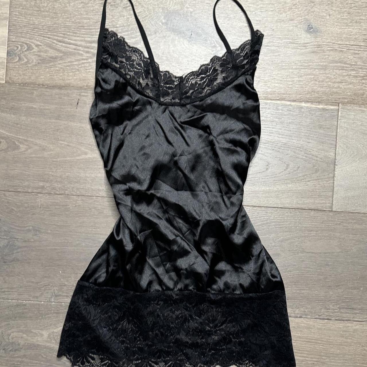 Black satin slip with lace trim medium but fits... - Depop