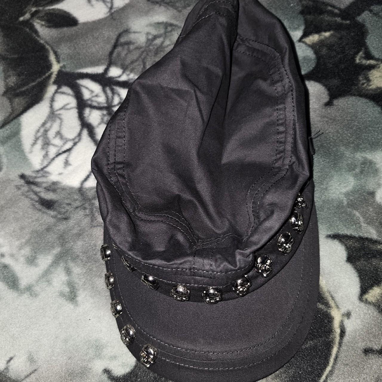 Black hat with metal skull charms This has never... - Depop
