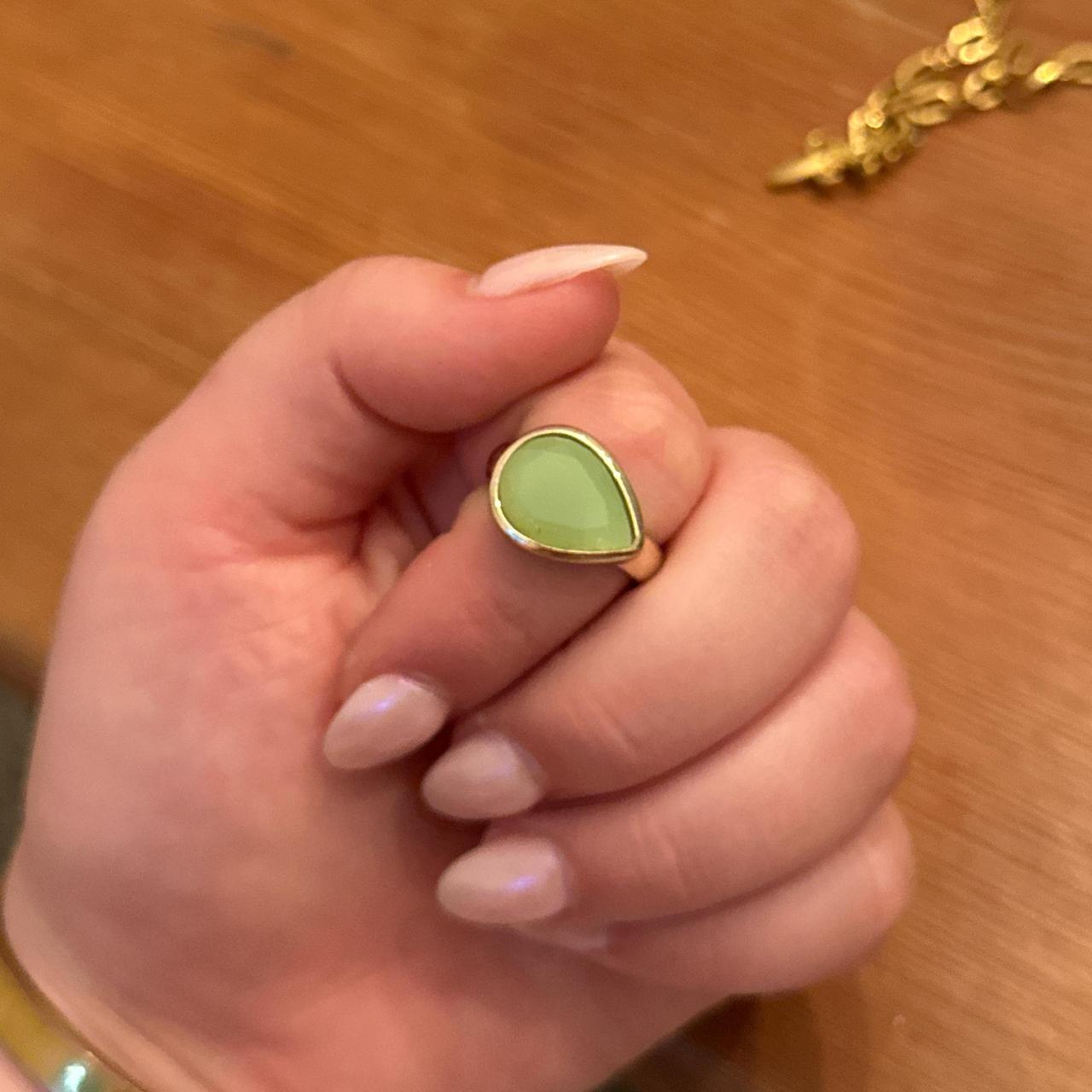 Beautiful green stone ring with gold accents... - Depop