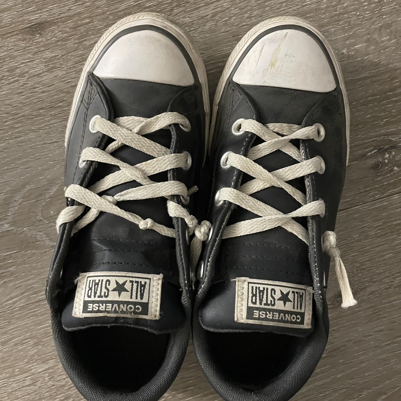 Black Converse trainers with a scuff on the toe... | Depop