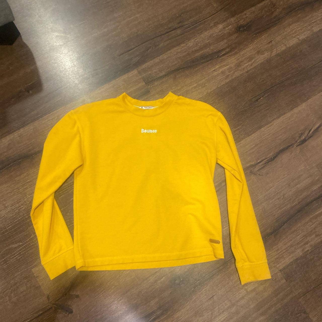 yellow hush puppies bounce tshirt - Depop