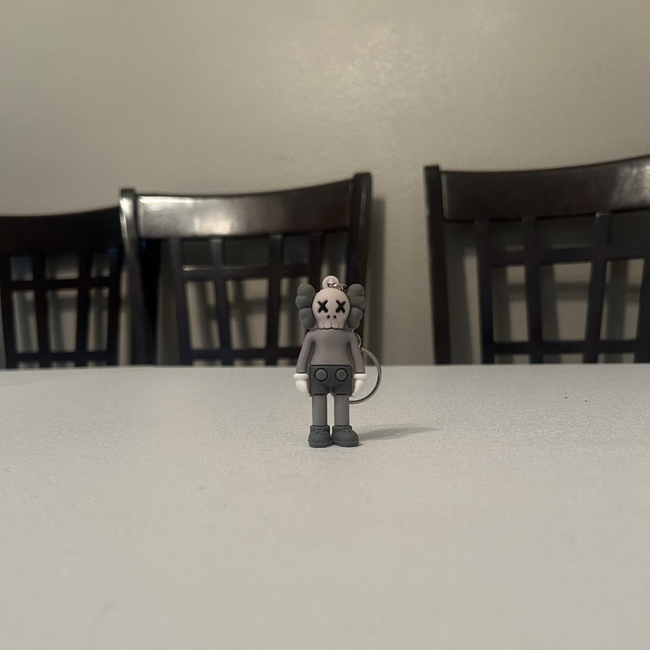 Kaws Collectible Keychain Grey and White Kaws... - Depop