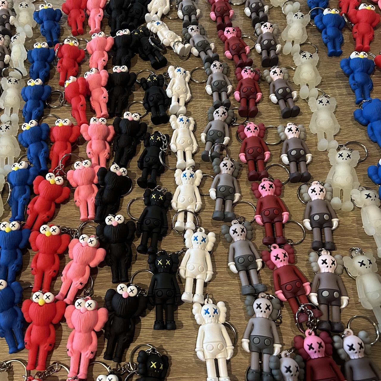 Kaws Collectible Keychain Grey and White Kaws... - Depop