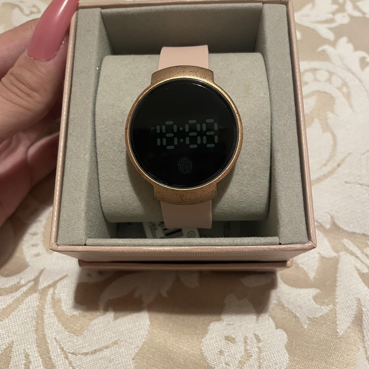 Pink and gold watch with a small flaw on the front... - Depop