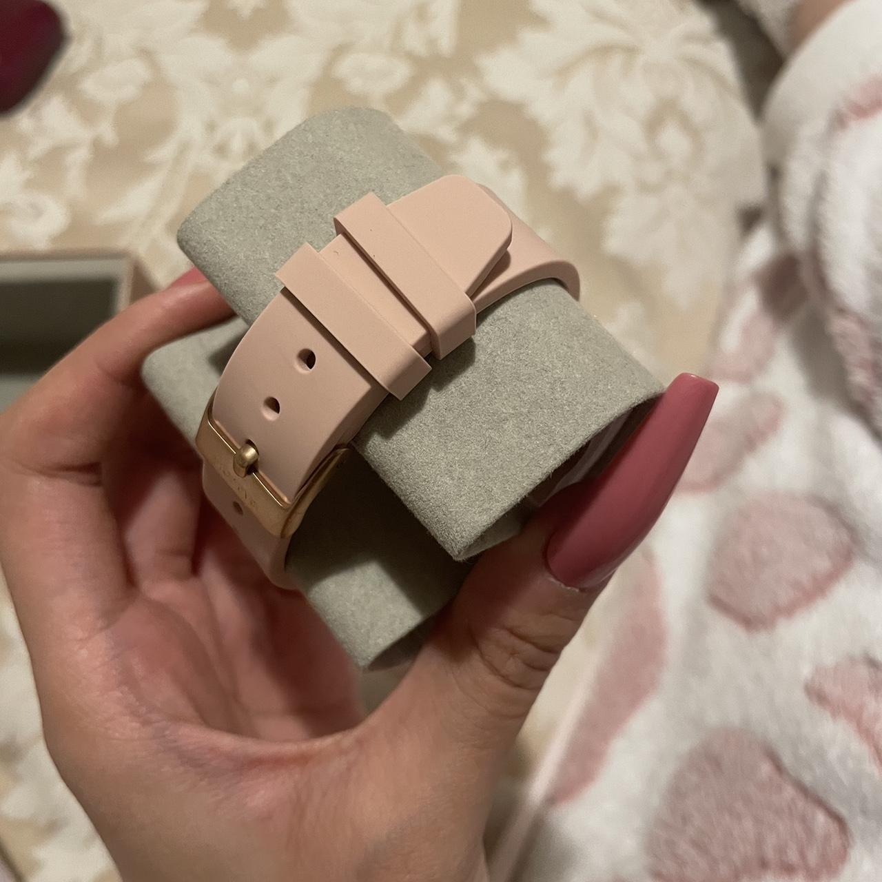 Pink and gold watch with a small flaw on the front... - Depop