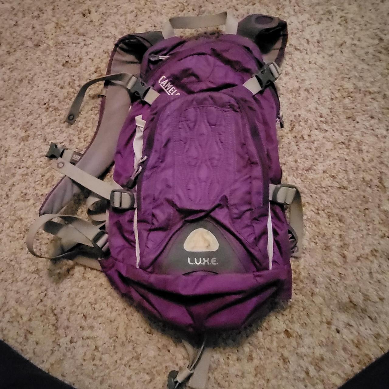 Purple and grey camelback hiking backpack. Has a... - Depop