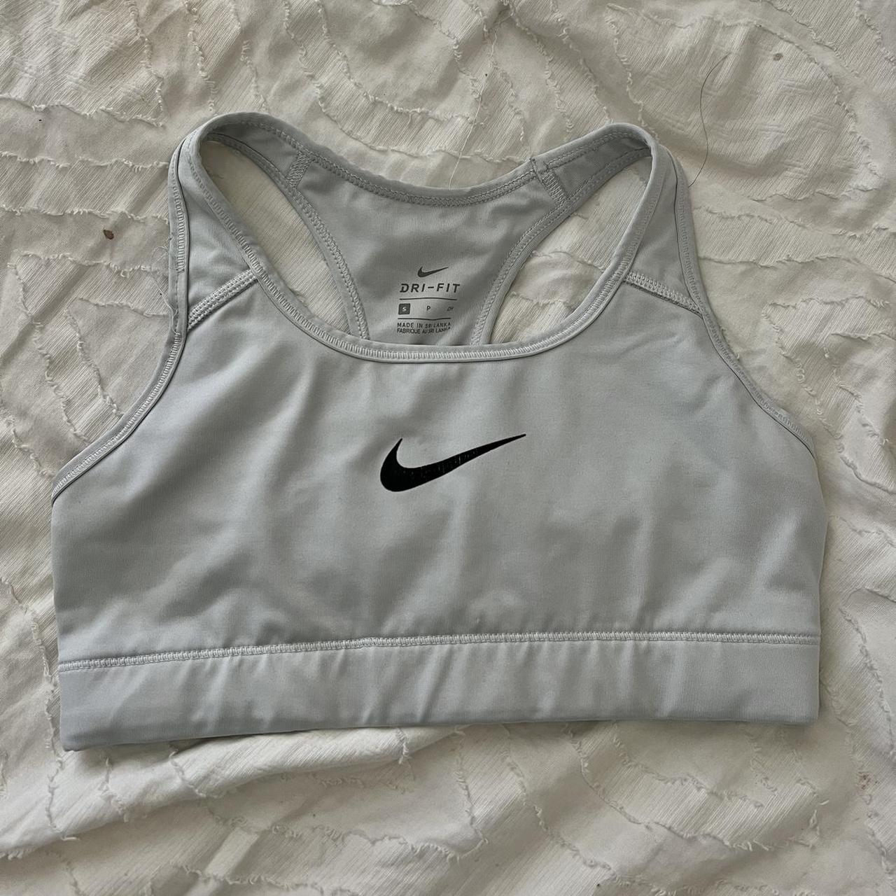 White nike dry-fit sports bra in size small. Good... - Depop