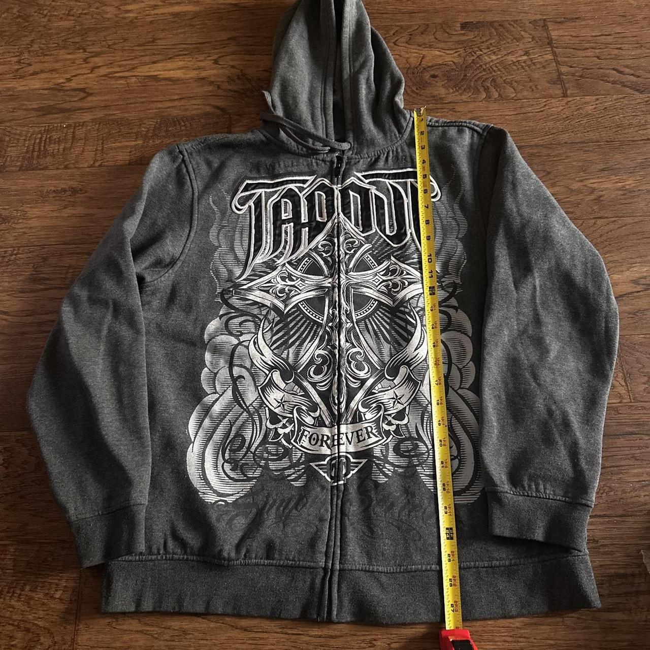 rare grey tapout cross design zip up hoodie Size... | Depop