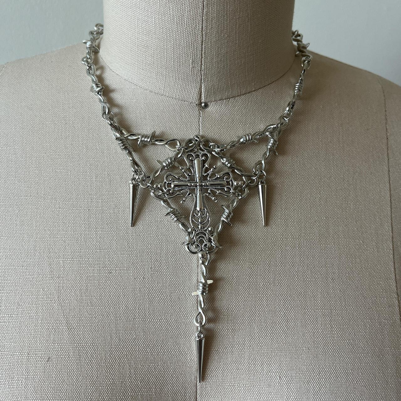 Silver cross necklace with spikes and barbed wire,... - Depop