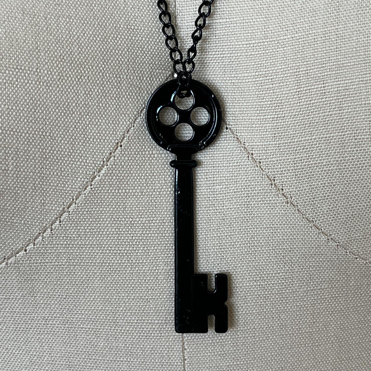 All Black key necklace with button detail... | Depop