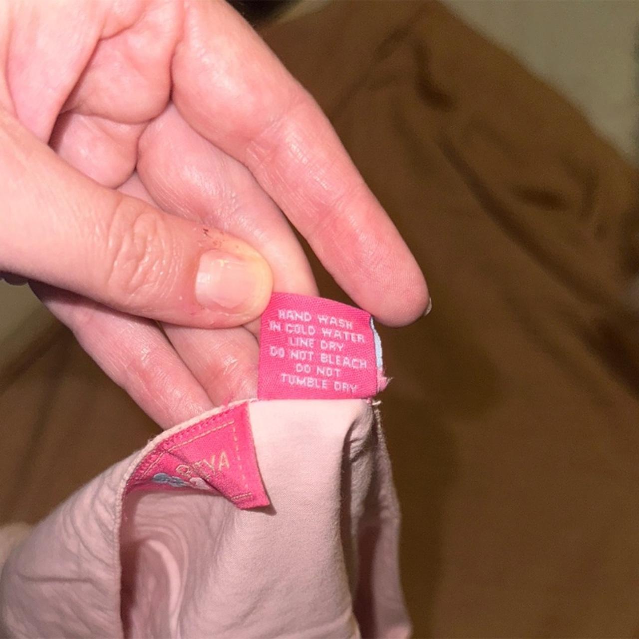 Pink and white mini skirt with ribbon detail. Worn... - Depop