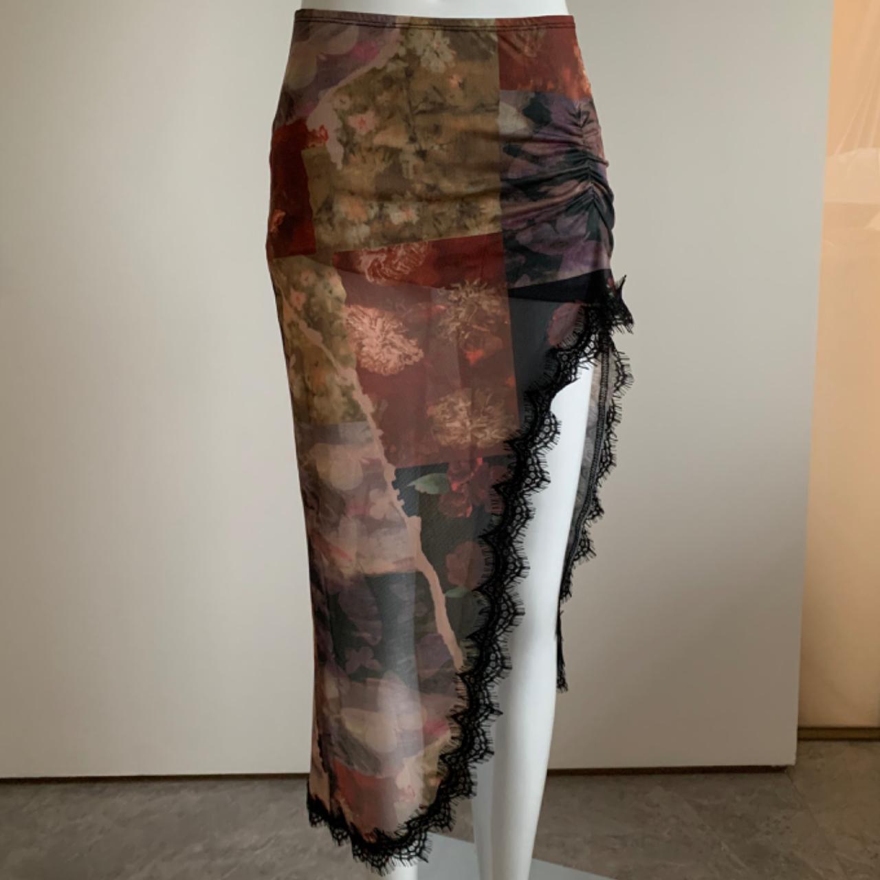 Mesh overlay skirt with lace trim and side zipper -... - Depop