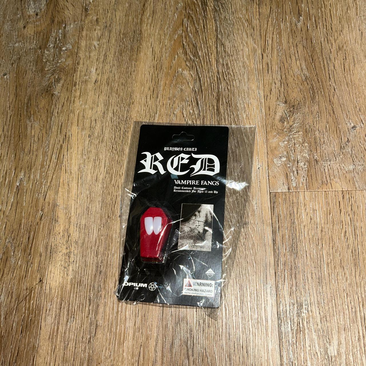 Playboi Carti vampire fang teeth - Depop